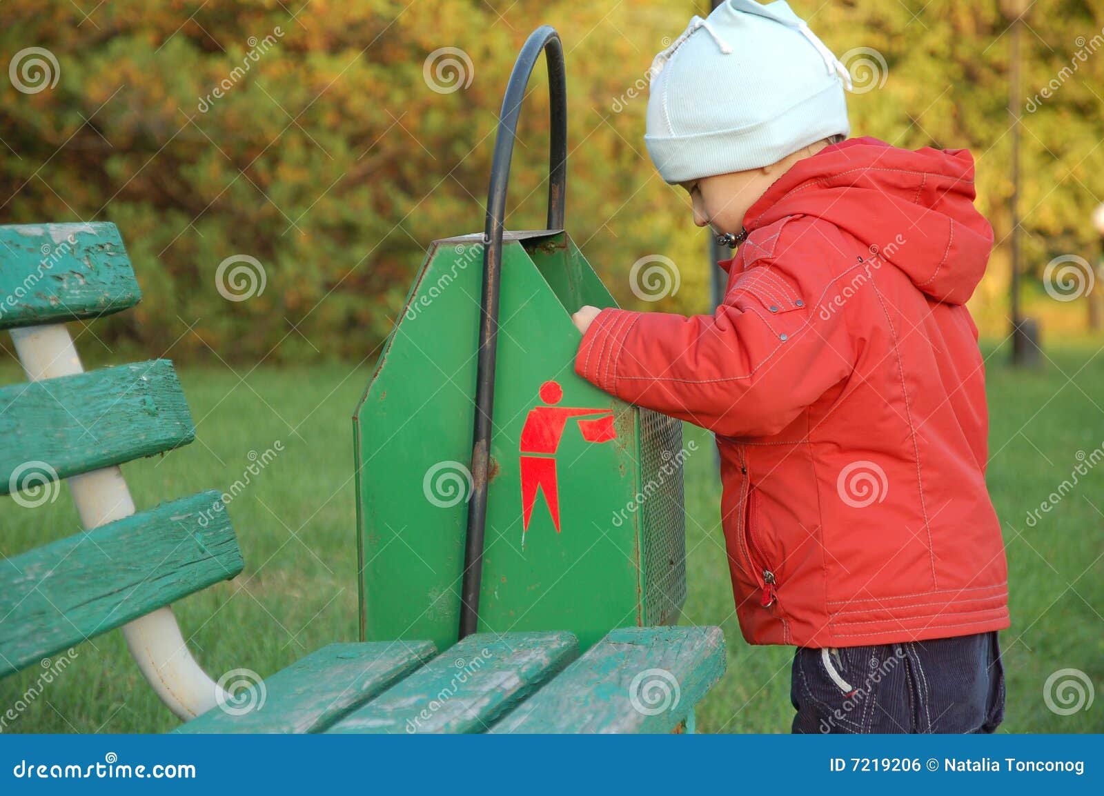 Little boy and garbage-can stock photo. Image of young - 7219206