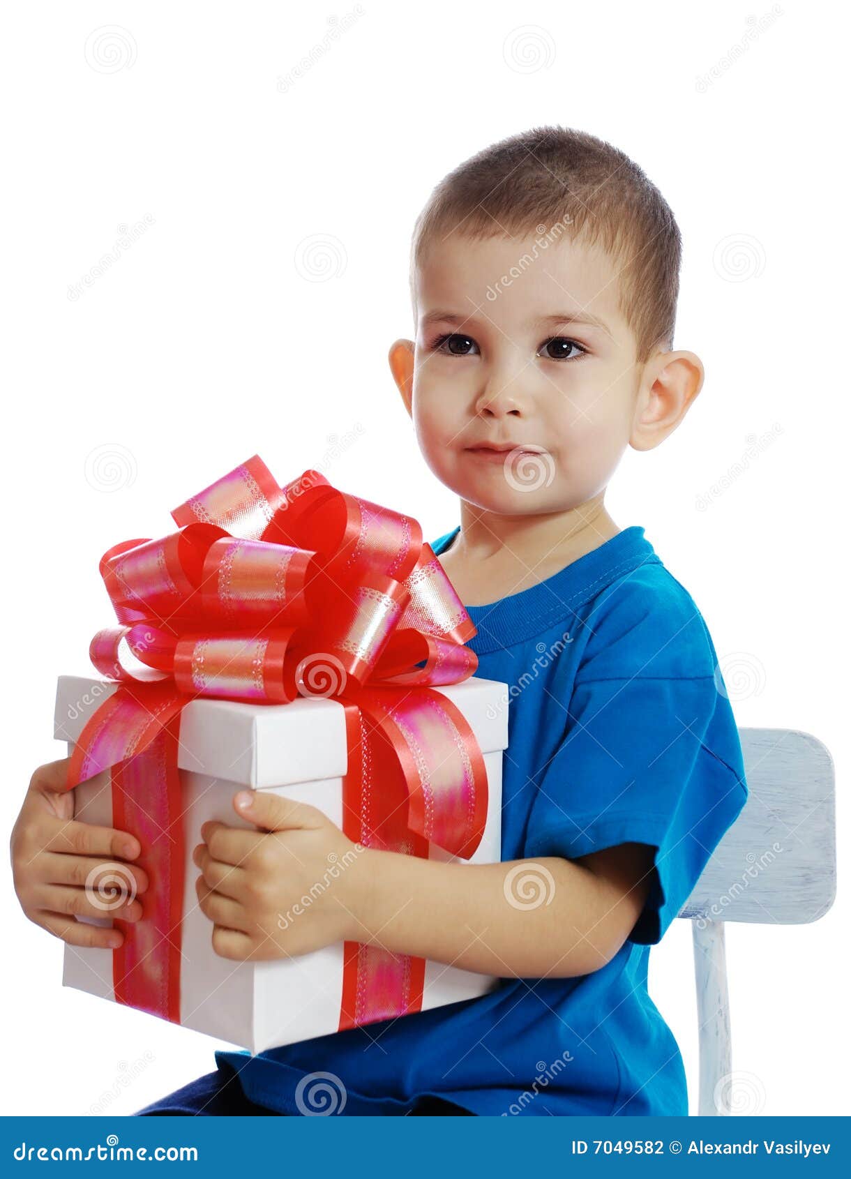 The little boy with a gift stock photo. Image of isolated - 7049582