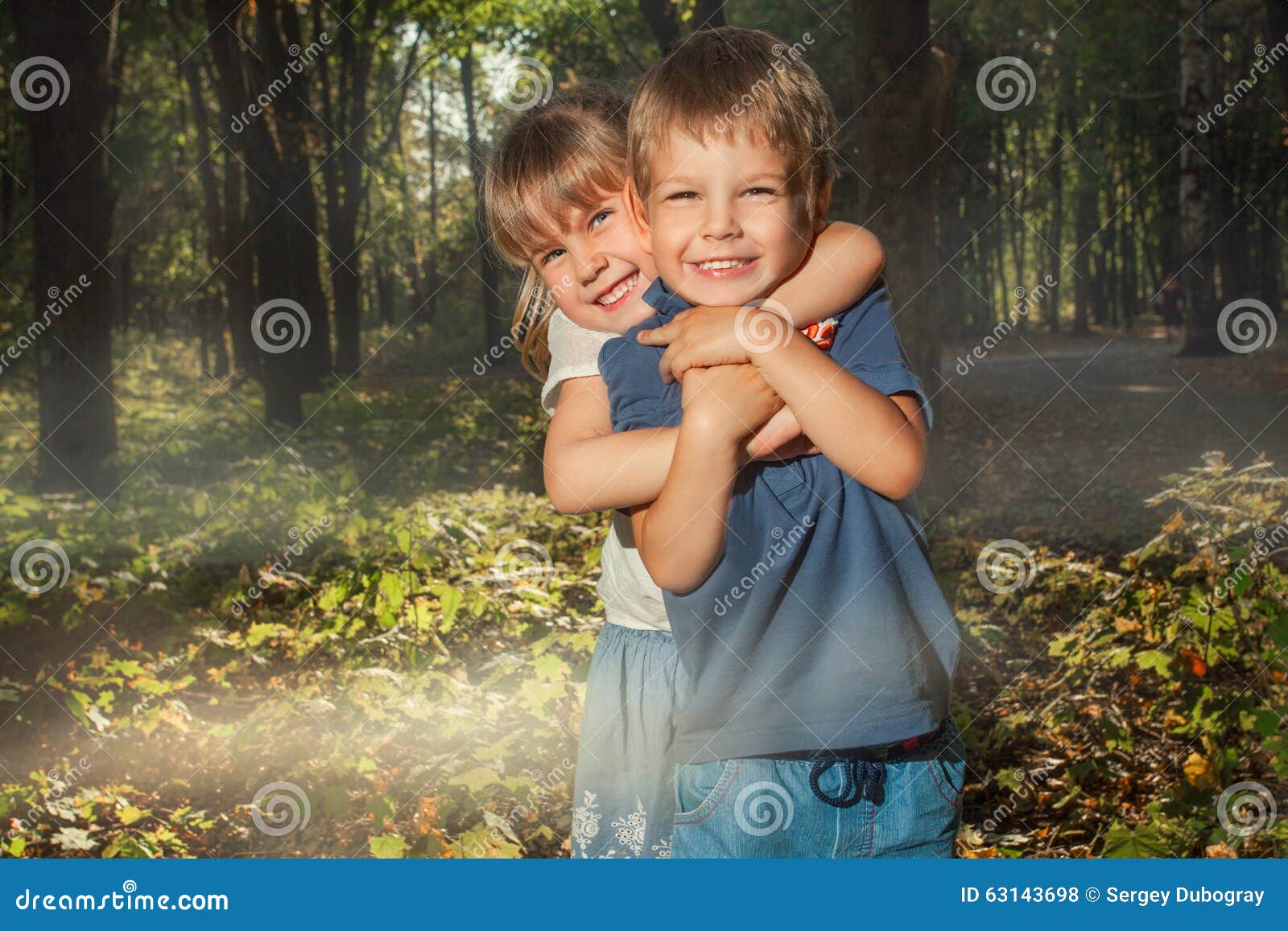 Little Boy and Girl Hugging Stock Photo - Image of boys, touching: 63143698