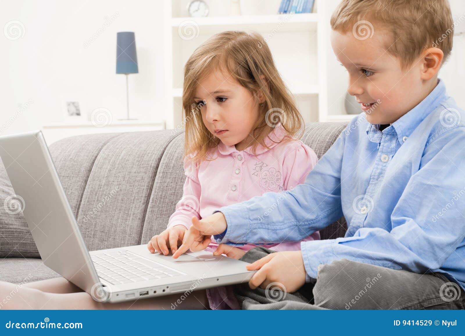 Little Boy and Girl Using Laptop Stock Image - Image of girl, brothers ...