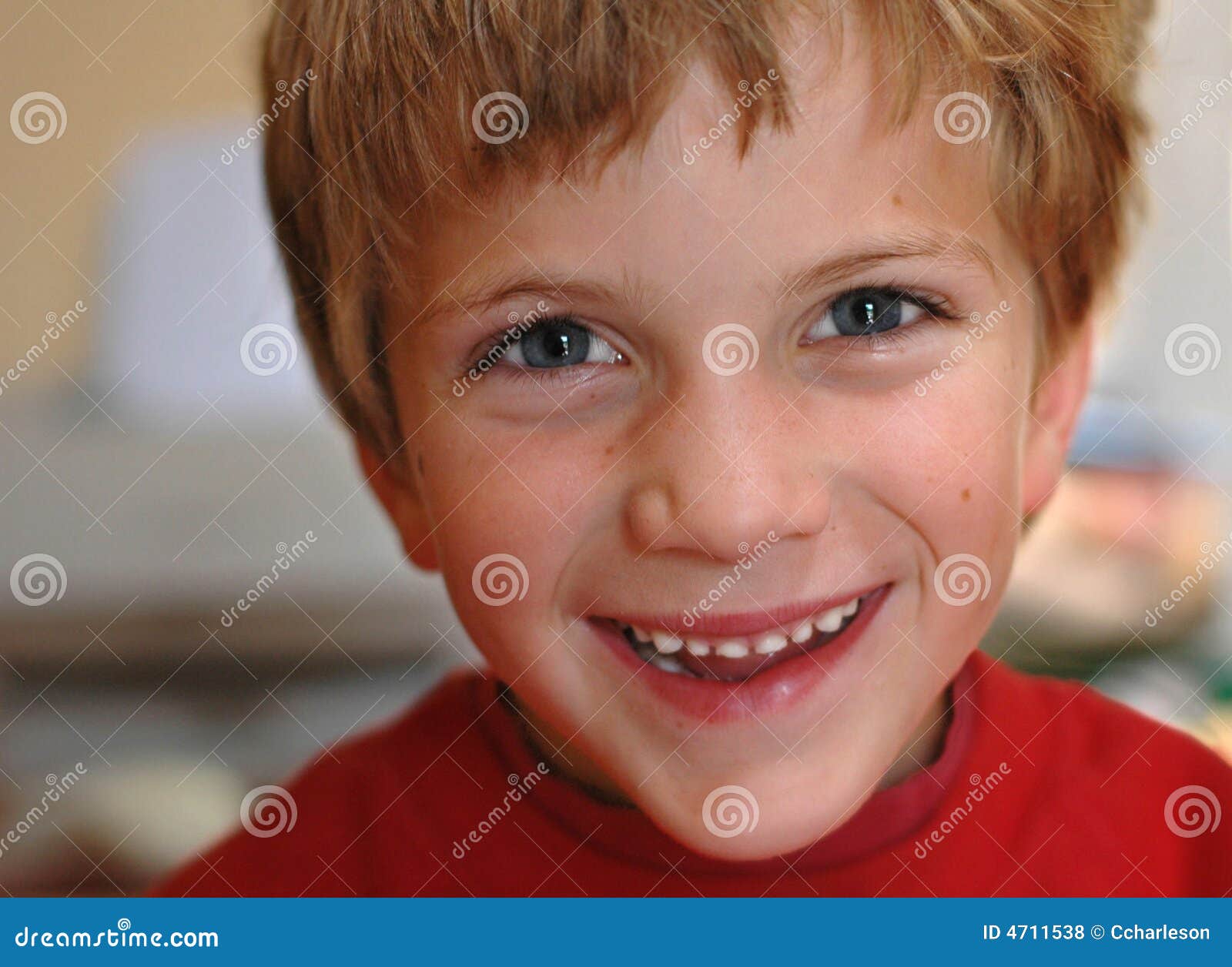 Little Boy Giving Cheeky Smile Stock Photo - Image of mischievous ...
