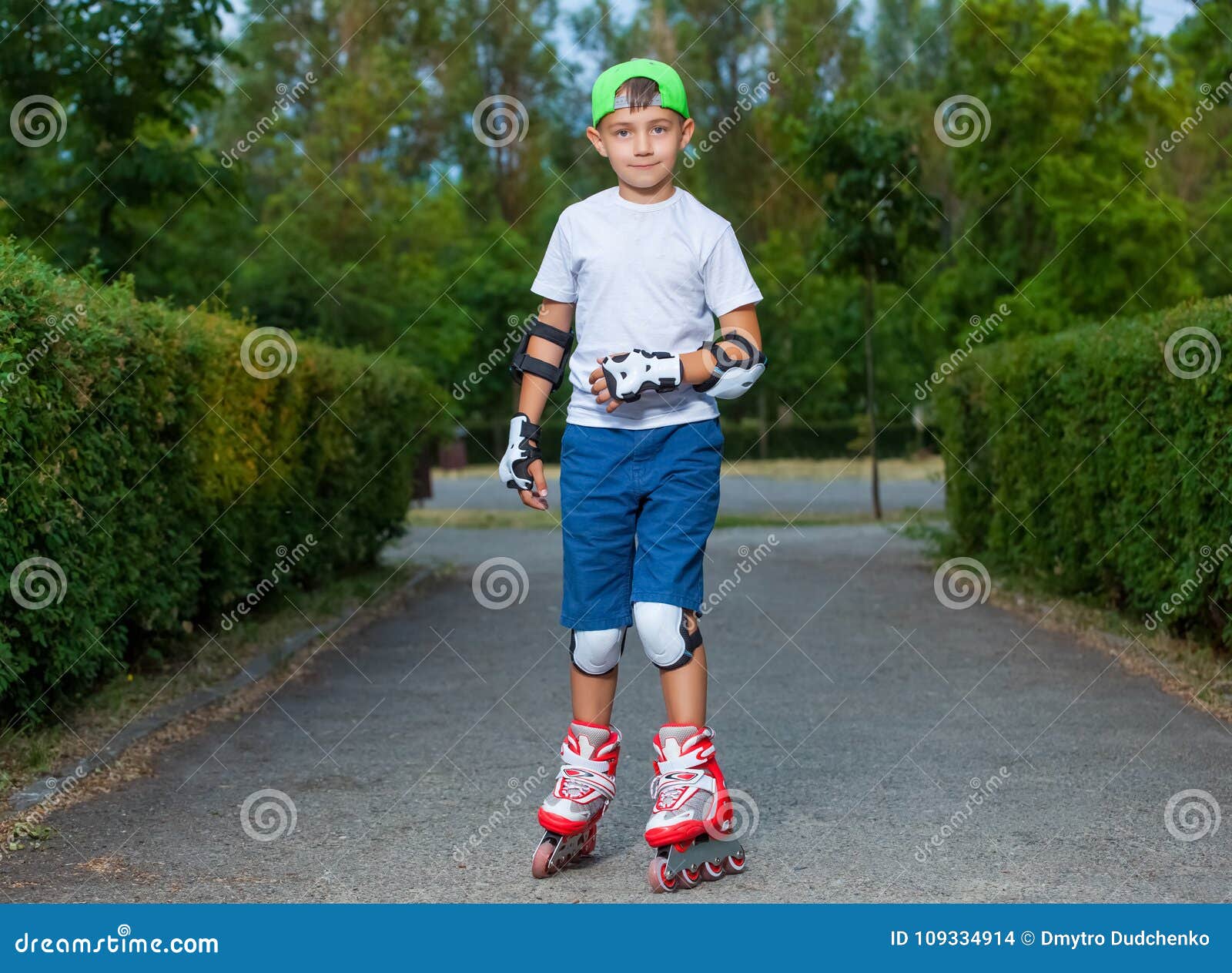 A Little Boy Goes Rollerblading in the Summer Stock Photo - Image of ...