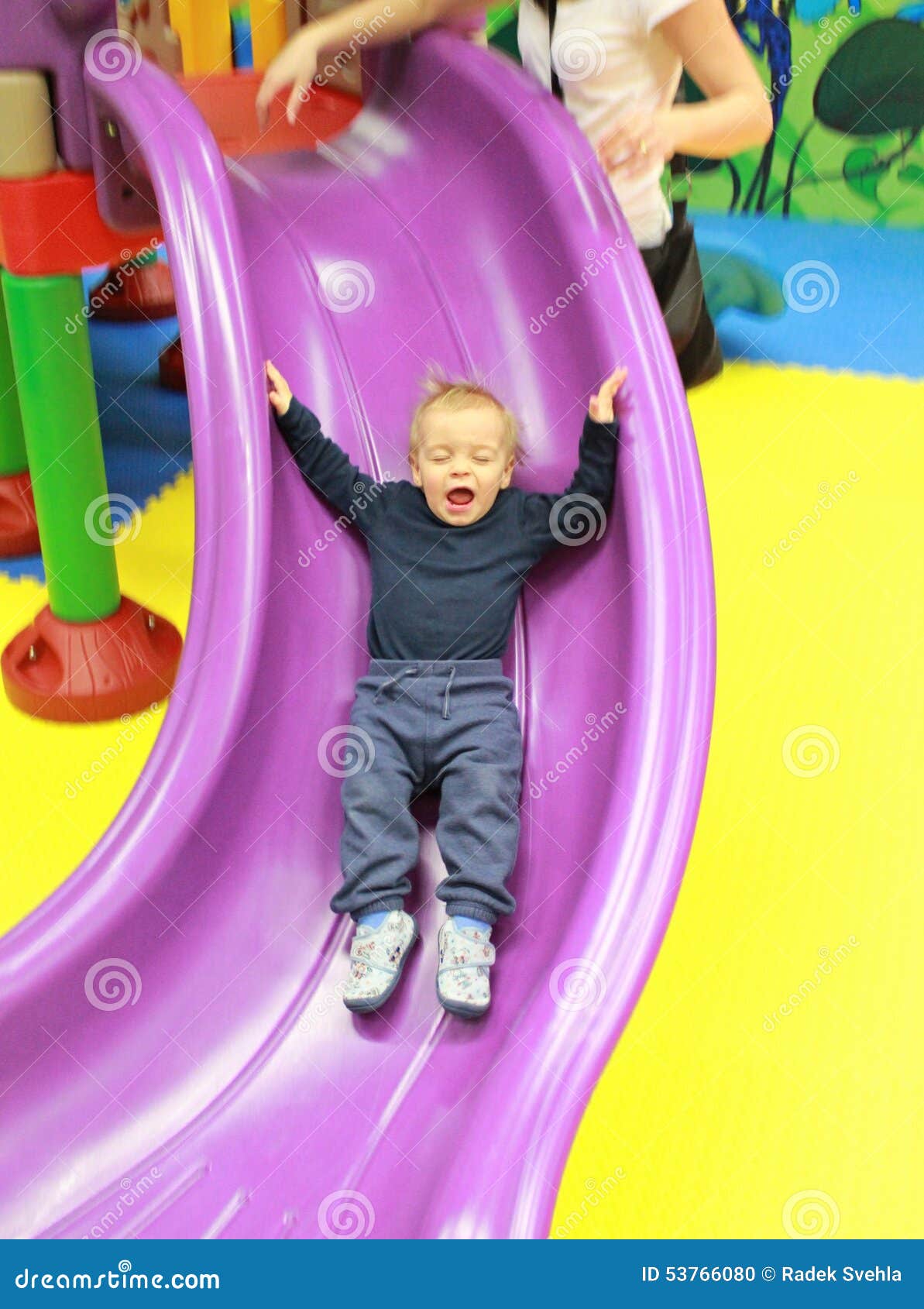 Little boy goes on a slide stock photo. Image of children - 53766080