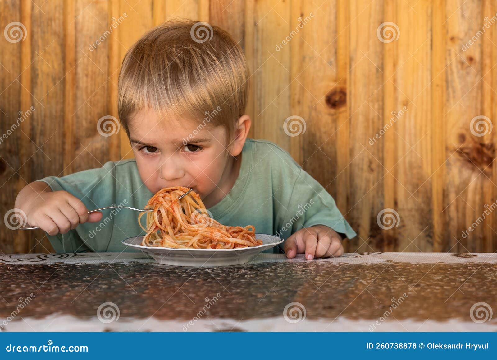 A Little Boy is Greedy Eating Spaghetti Stock Photo - Image of ...