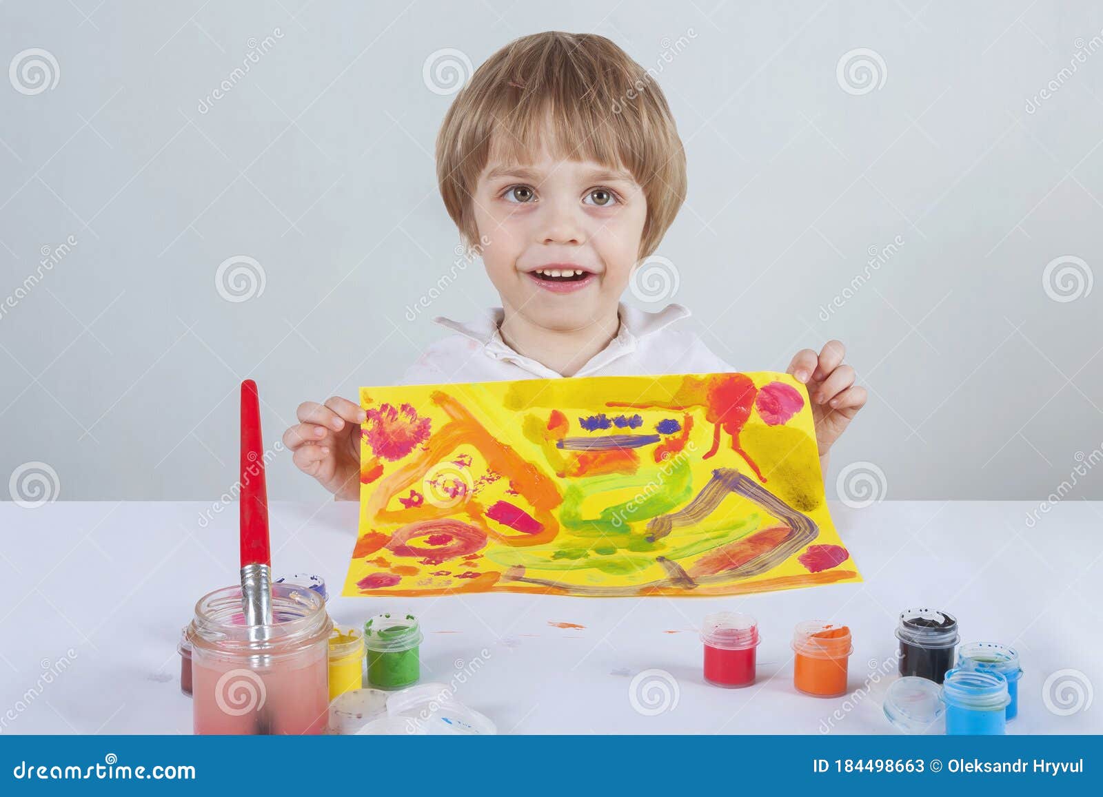The Little Boy Happily Shows the Picture he Drew Stock Image - Image of ...
