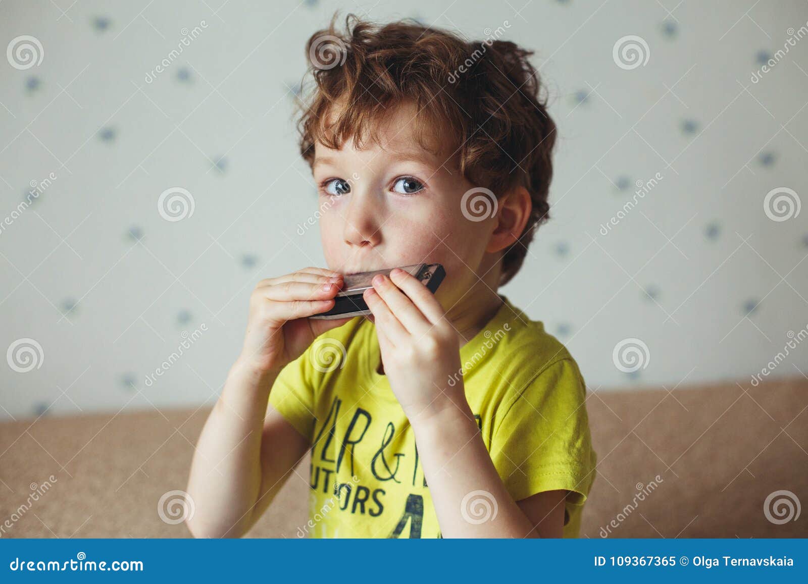 Little Boy with the Harmonica. Education Concept. Music Concept Stock ...