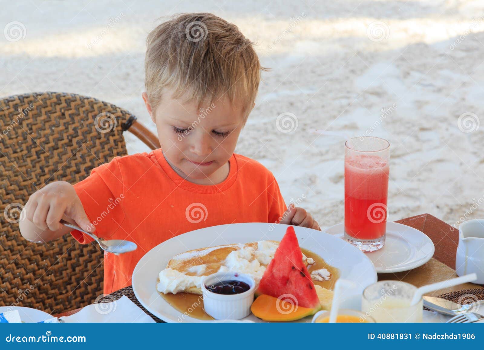 Little Boy Having Breakfast at the Resort Stock Image - Image of casual ...