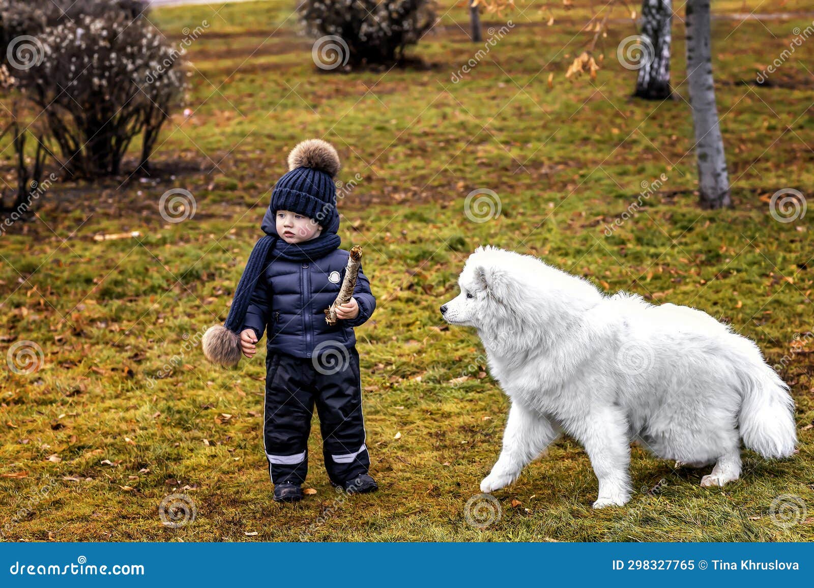 Dog and master on a walk stock image. Image of puppy - 298327765