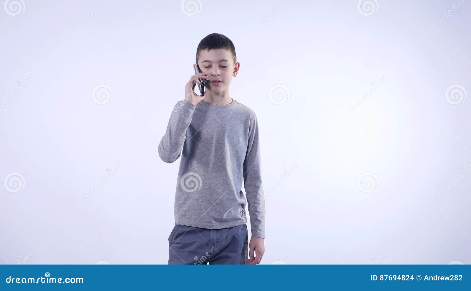 Little Boy Having a Phone Call Isolated on White Background Stock ...