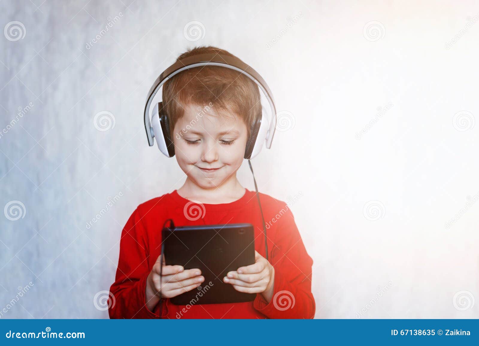 Little Boy with Headset Using Touch Pad, Early Education and Pla Stock ...