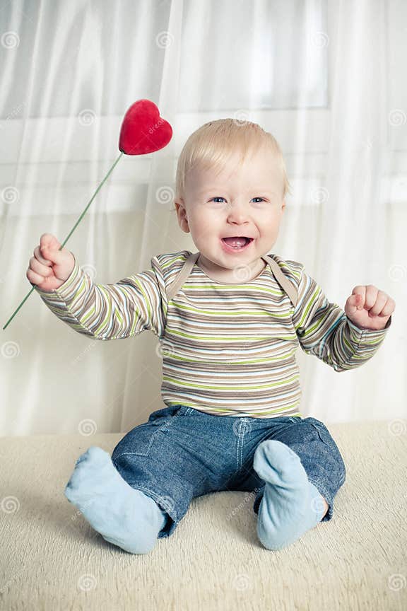 Little boy with heart stock image. Image of child, happy - 12777521