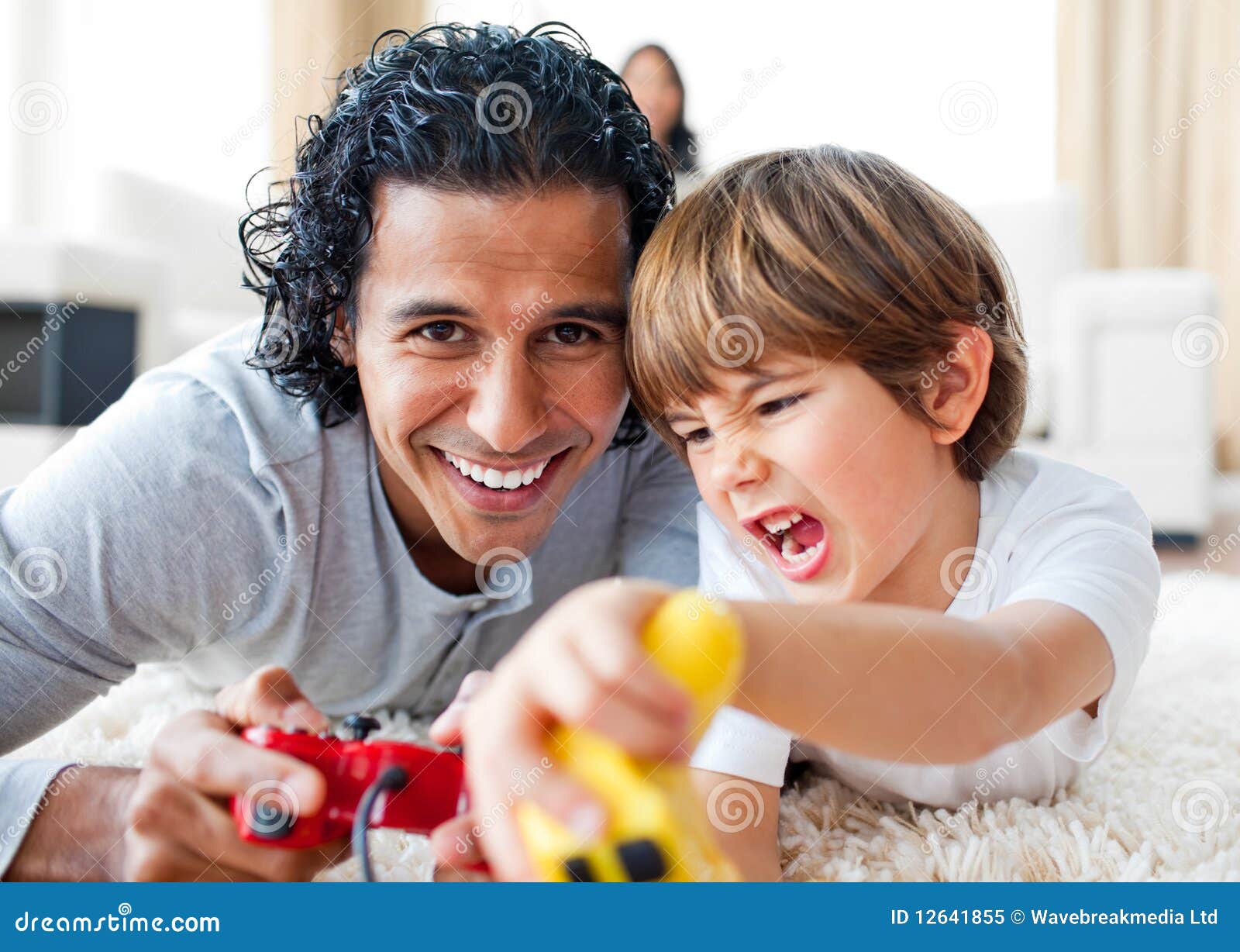 Little Boy and His Father Playing Video Games Stock Image - Image of ...