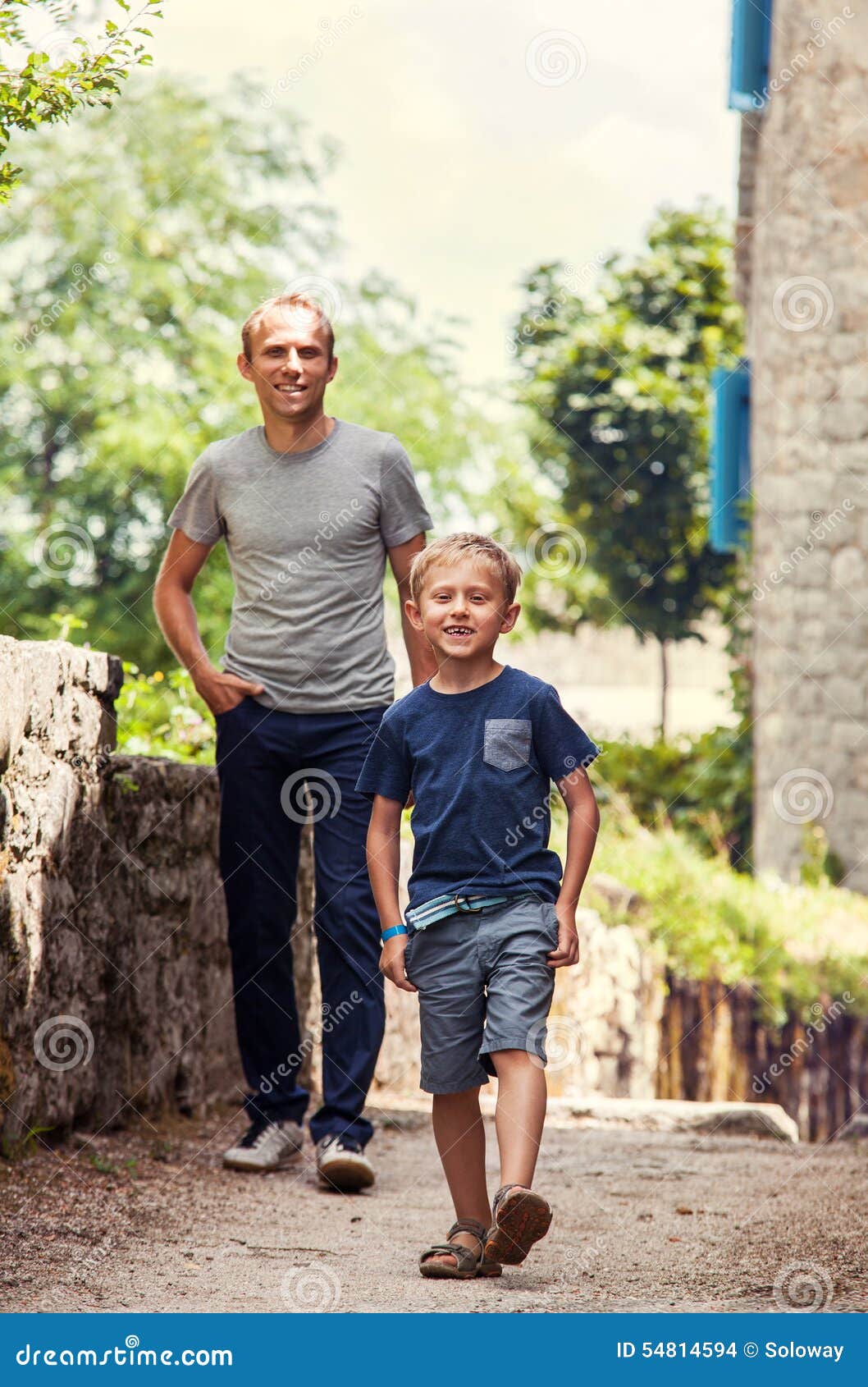 Little Boy With His Father Walk Together Royalty-Free Stock Image ...