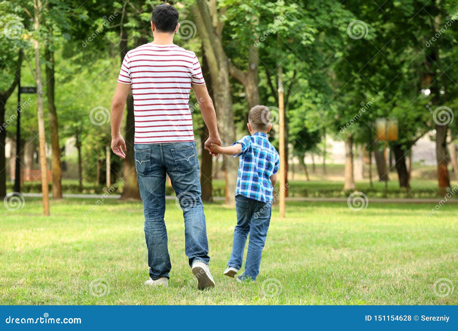 Little Boy and His Father Walking Outdoors Stock Photo - Image of ...