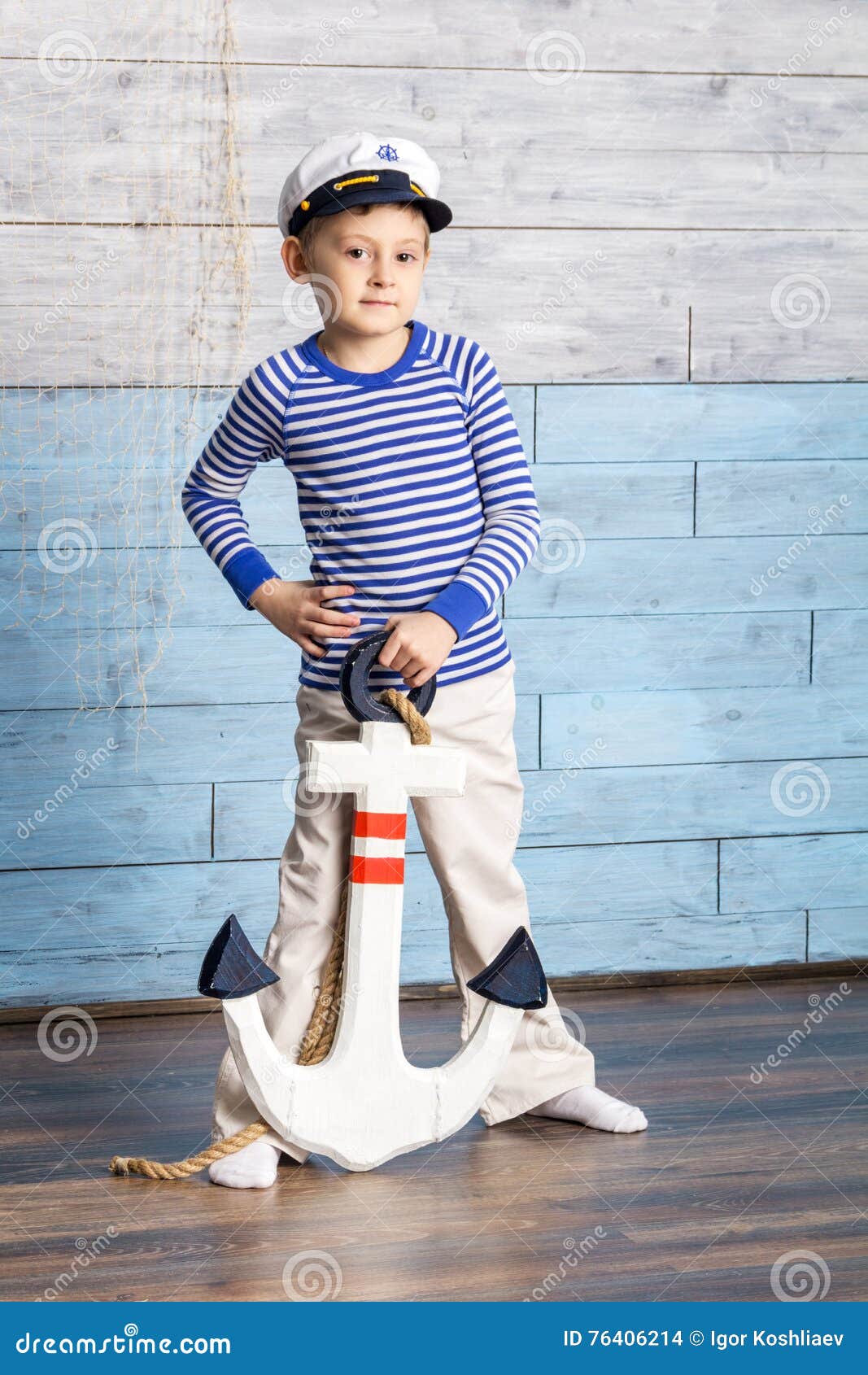 Little boy holding anchor stock photo. Image of nautical - 76406214