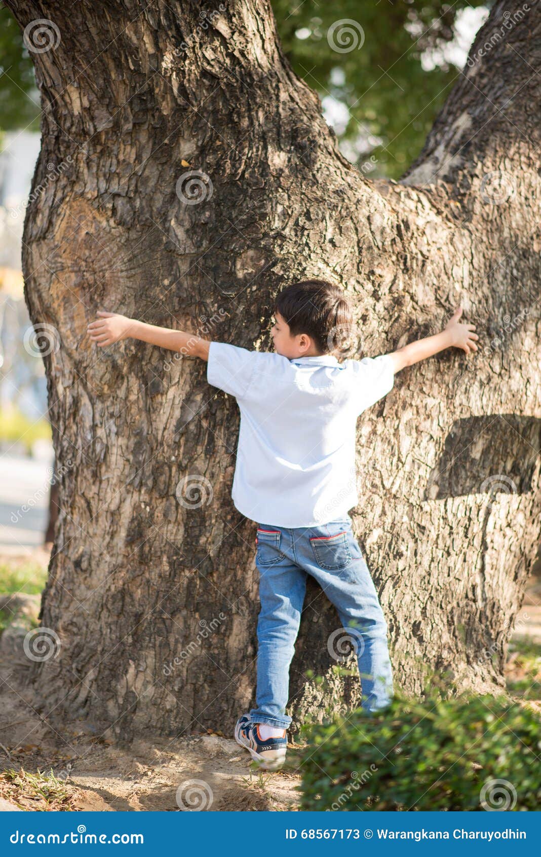 Little Boy Checking His Height At School With Measuring Height Scale On ...