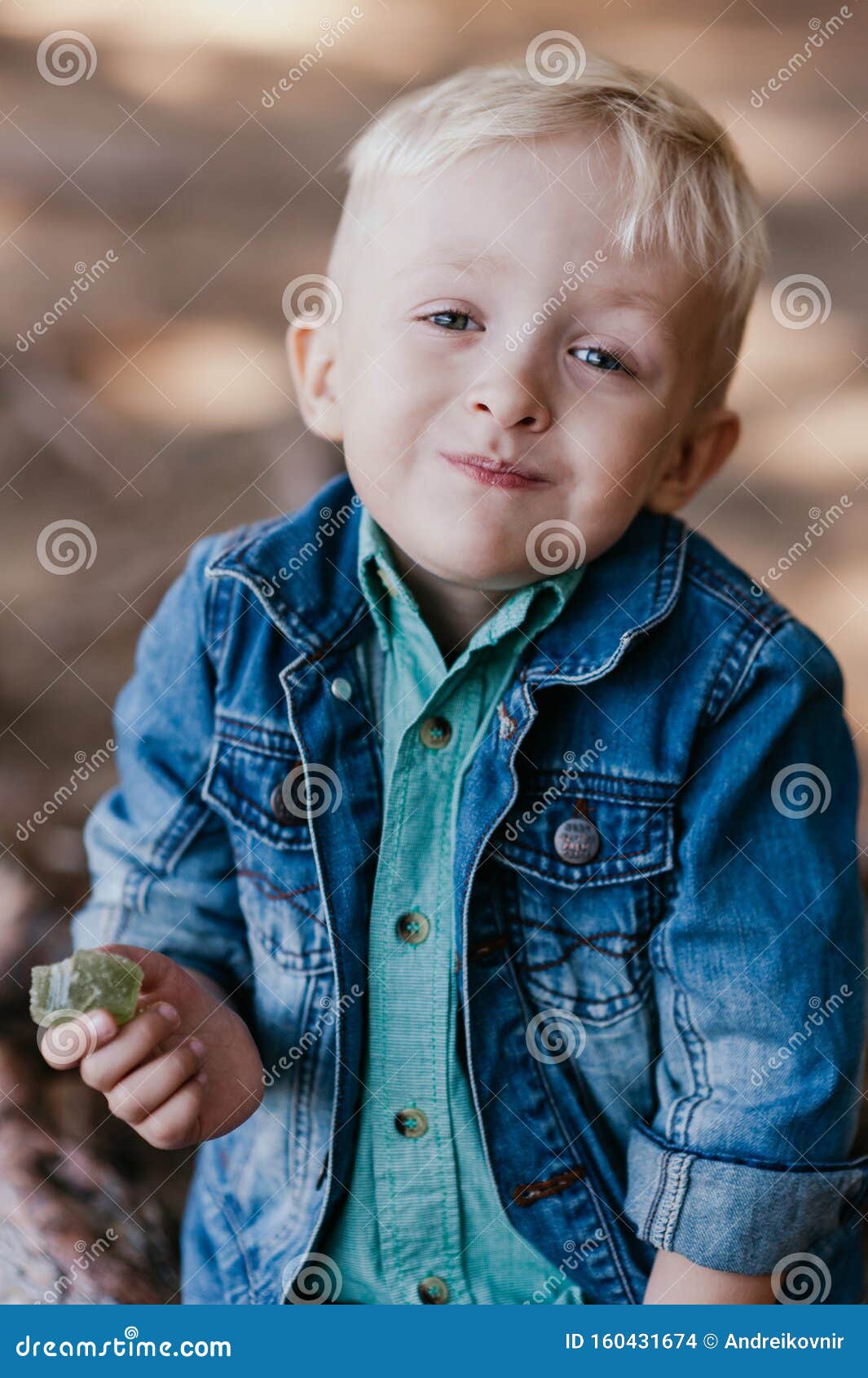 Little Boy Holding a Cup of Tea Outdoors. Child Drinks Tea Stock Photo ...