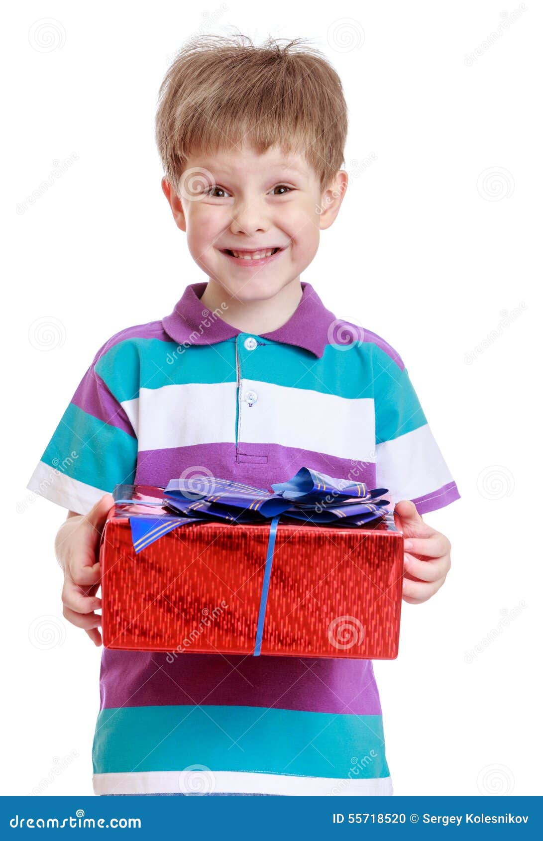 Little boy holding a gift stock photo. Image of happy - 55718520
