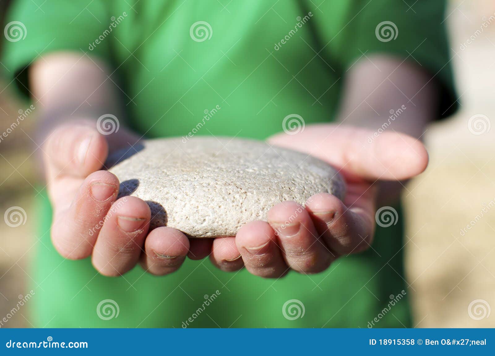 Little Boy Holding Stone stock photo. Image of horizontal - 18915358