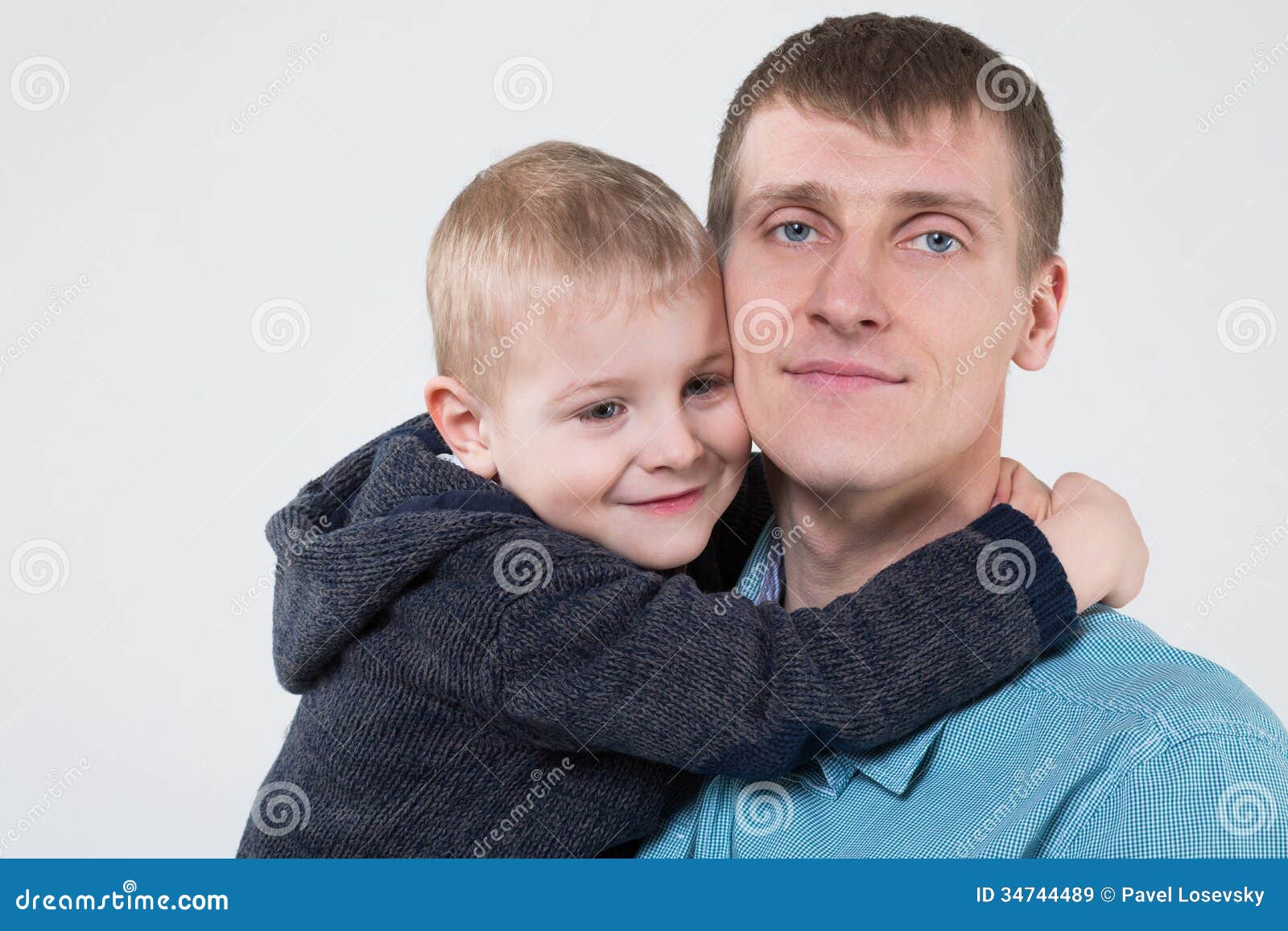 Little Boy Hugging His Father Stock Image - Image of adult, attractive ...
