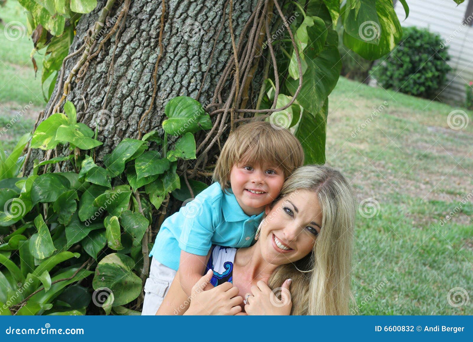 Little boy hugging mom stock photo. Image of portrait - 6600832