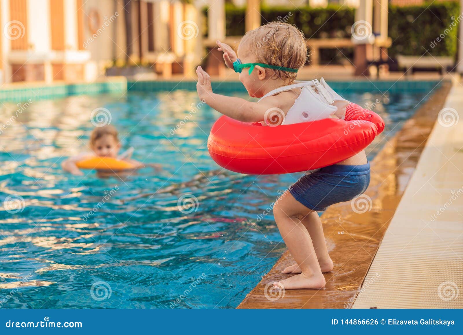 Little Boy with Inflatable Circle at Pool Stock Photo - Image of happy ...