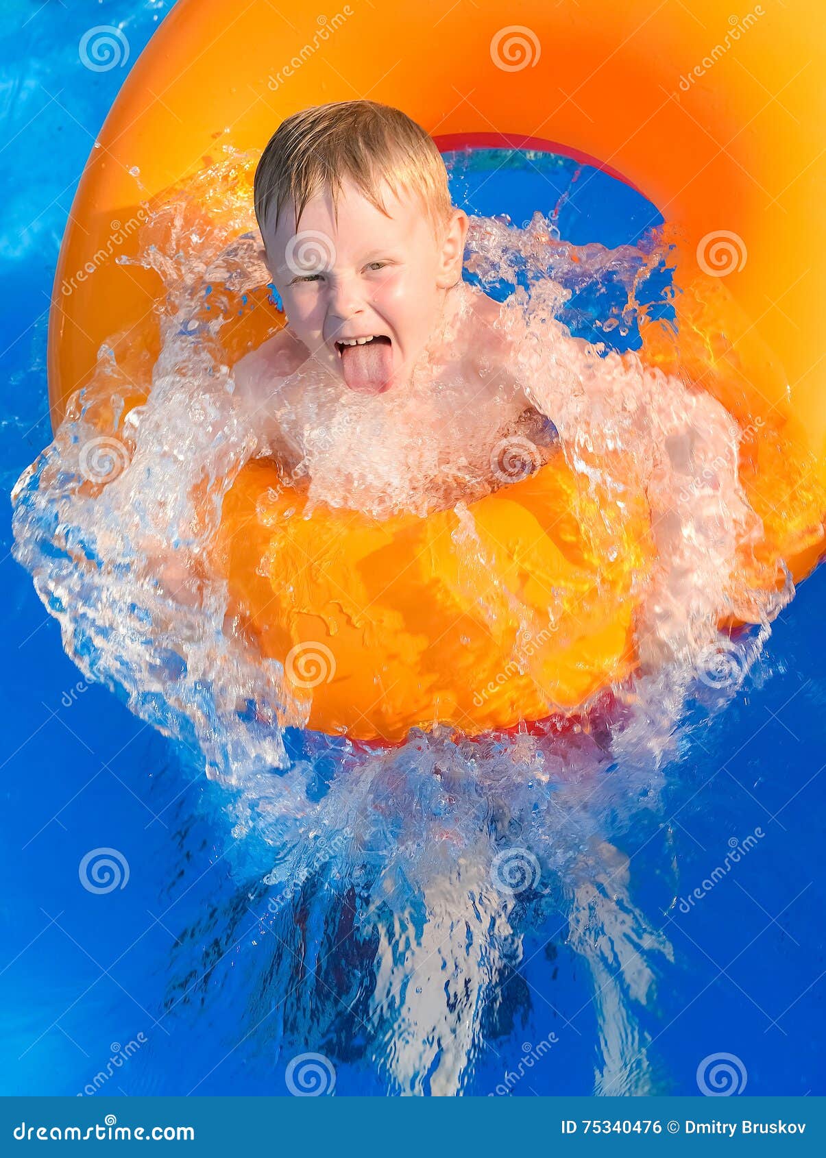 Little Boy on an Inflatable Circle in the Water Stock Photo - Image of ...