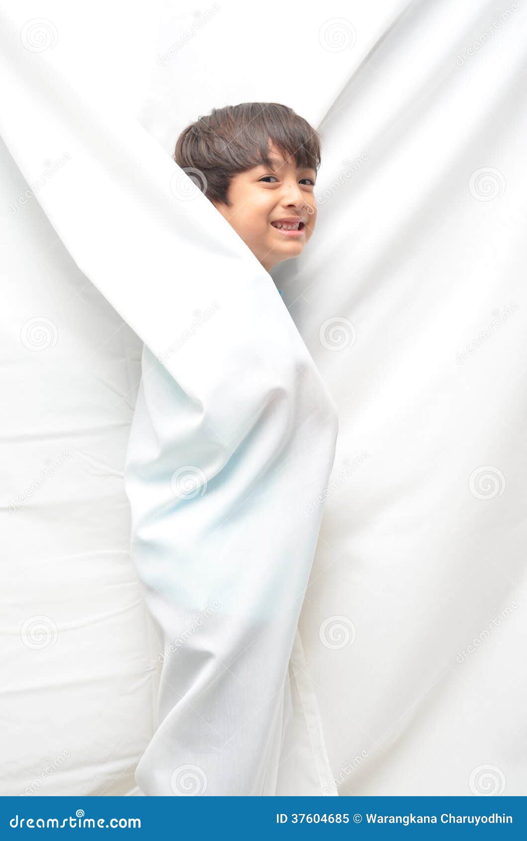 Little Boy Inside White Fabric Stock Image - Image of washalble, fabric ...
