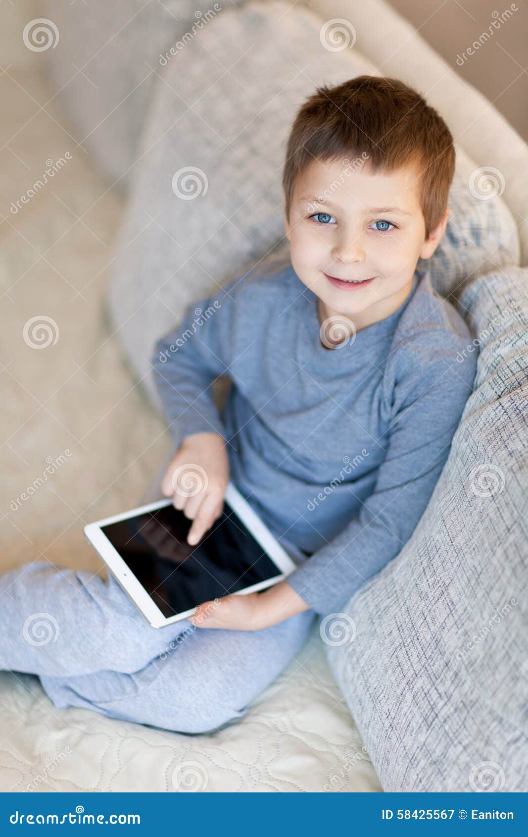 Little boy with iPad stock image. Image of board, hold - 58425567