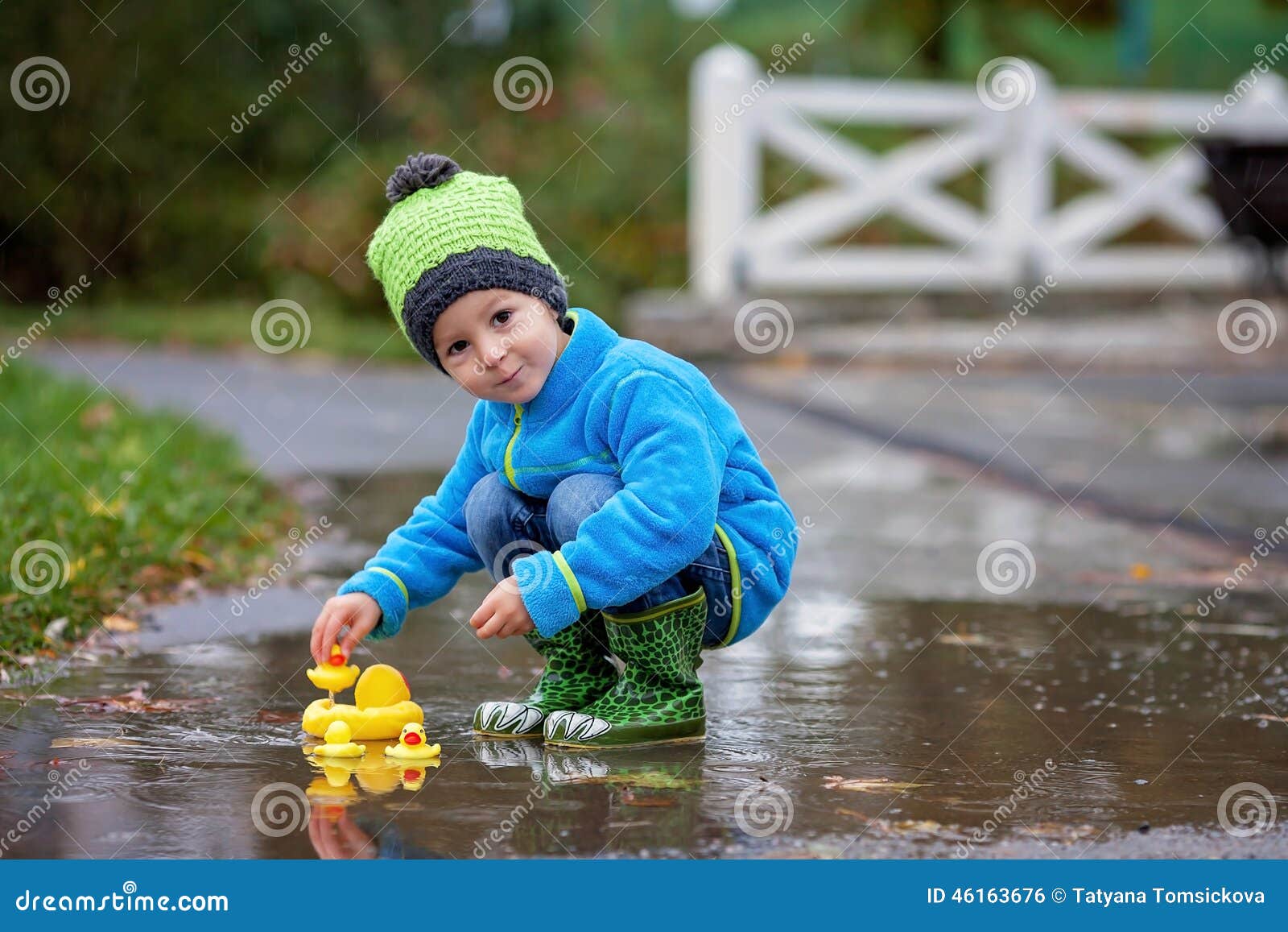 Little Boy, Jumping in Muddy Puddles Stock Photo - Image of rainy ...