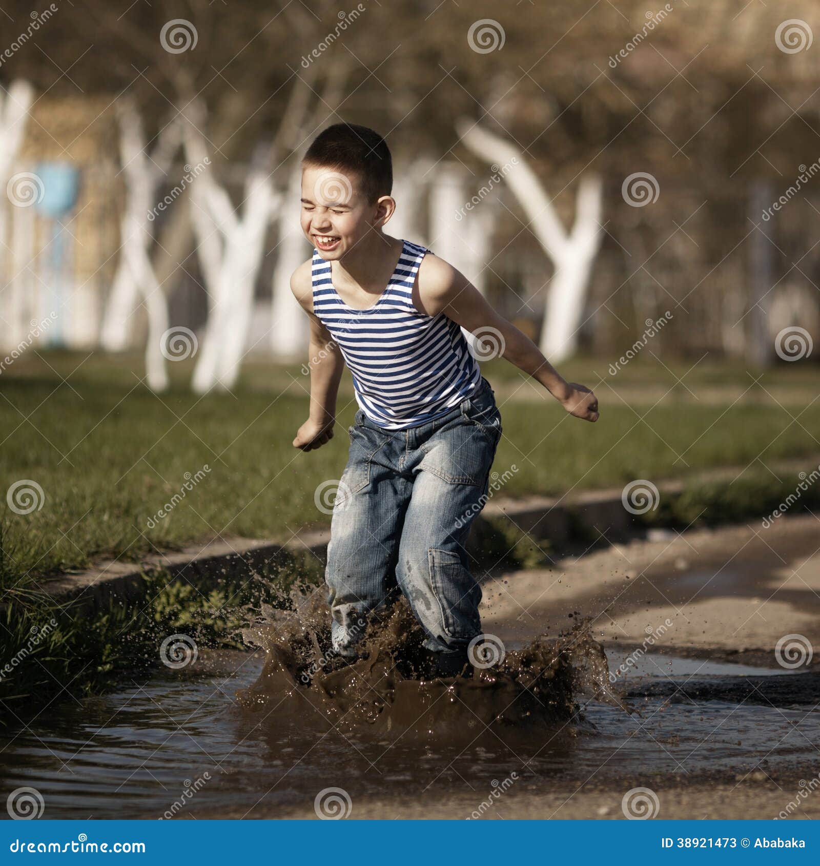 Little Boy Jumping in Puddle Stock Image - Image of reflection ...
