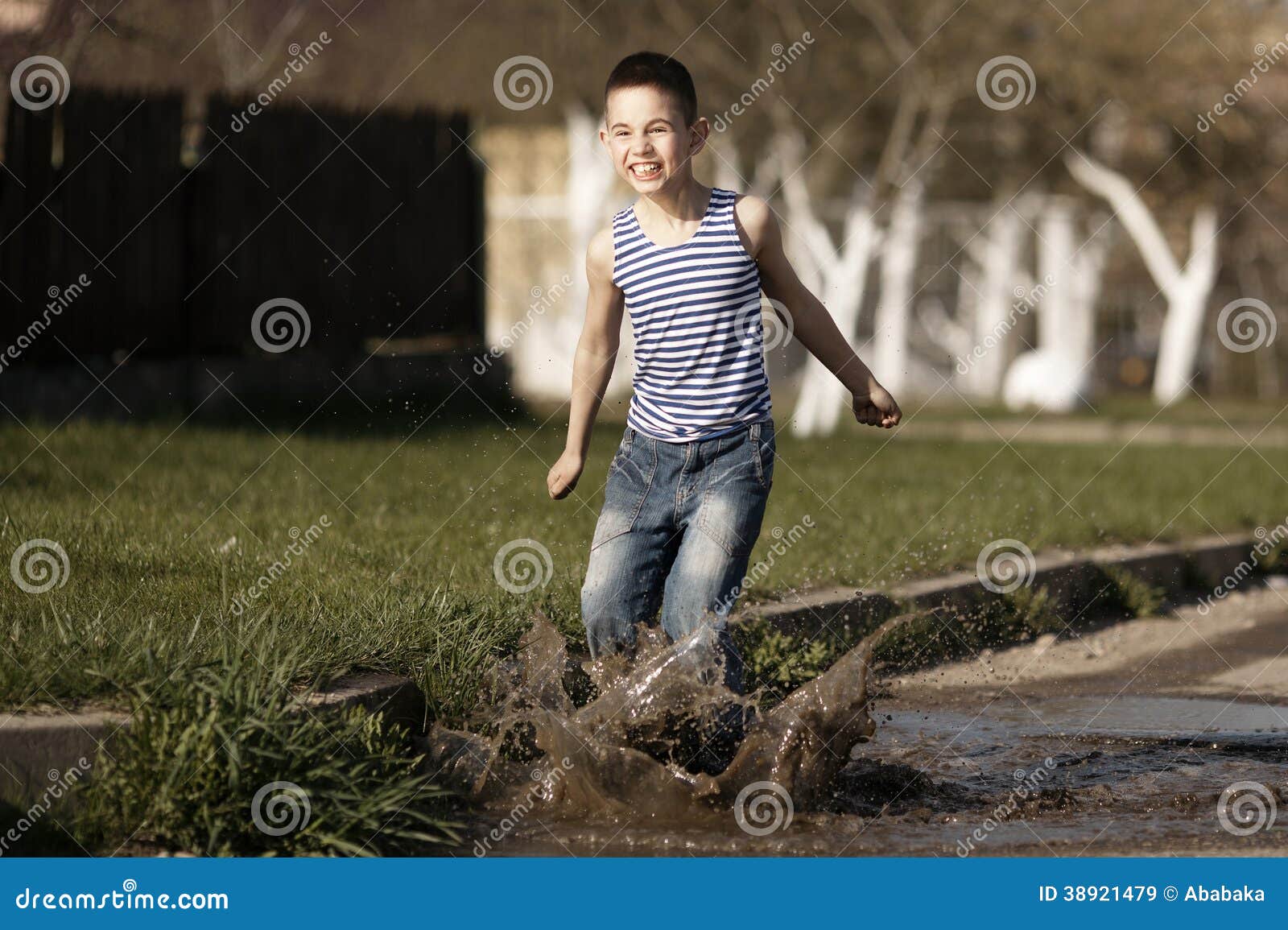 Little Boy Jumping in Puddle Stock Image - Image of jump, laugh: 38921479