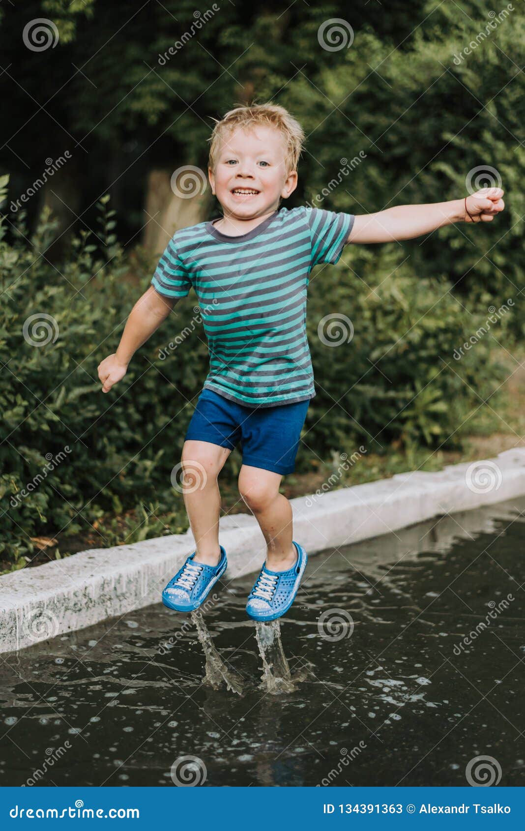 Little Boy Jumping in a Puddle in Summer Stock Image - Image of pool ...