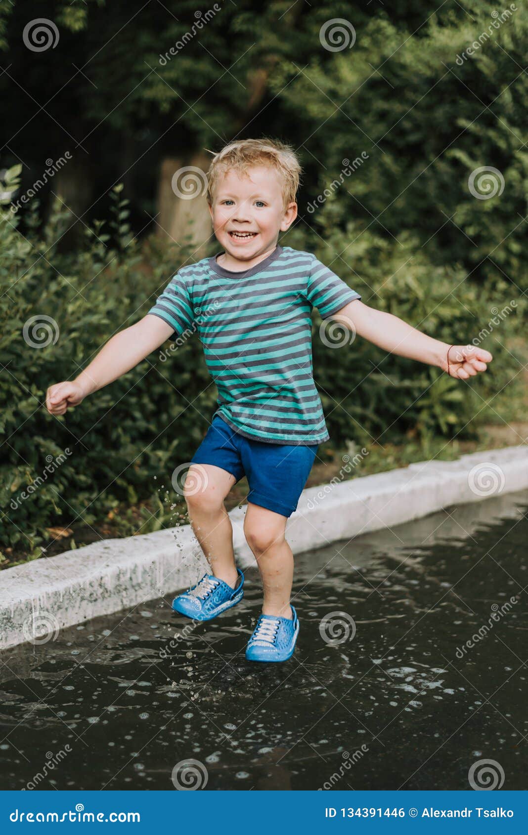 Little Boy Jumping in a Puddle in Summer Stock Photo - Image of pool ...