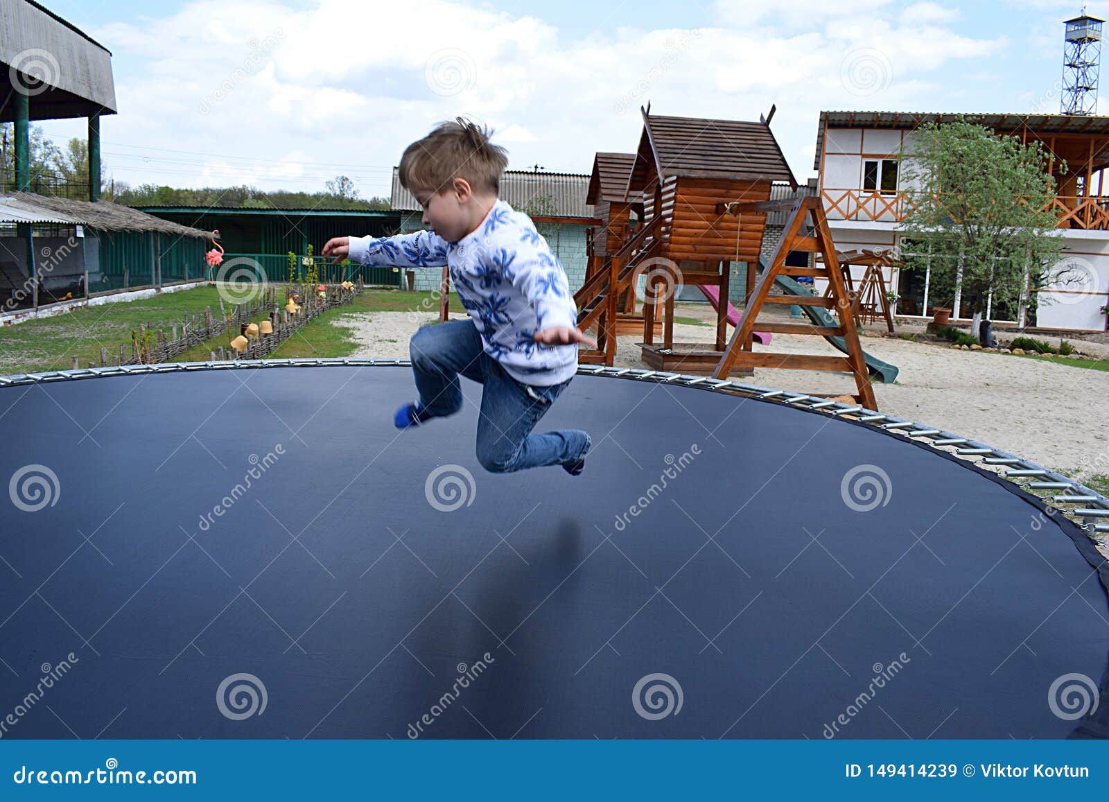 Little Boy Jumping on a Trampoline Stock Image - Image of childhood ...