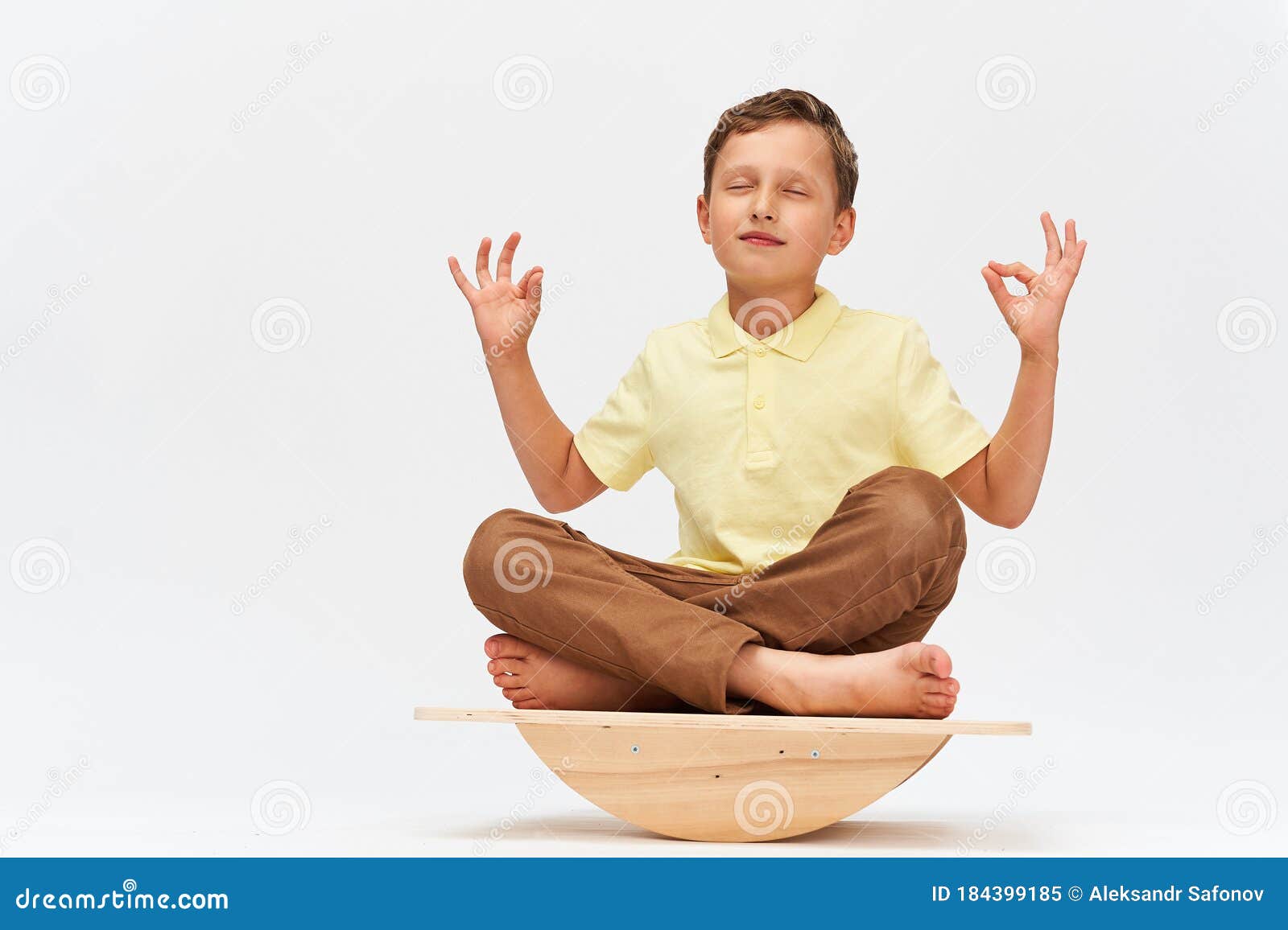 Little Boy Keeps His Balance on a Special Simulator for Training ...