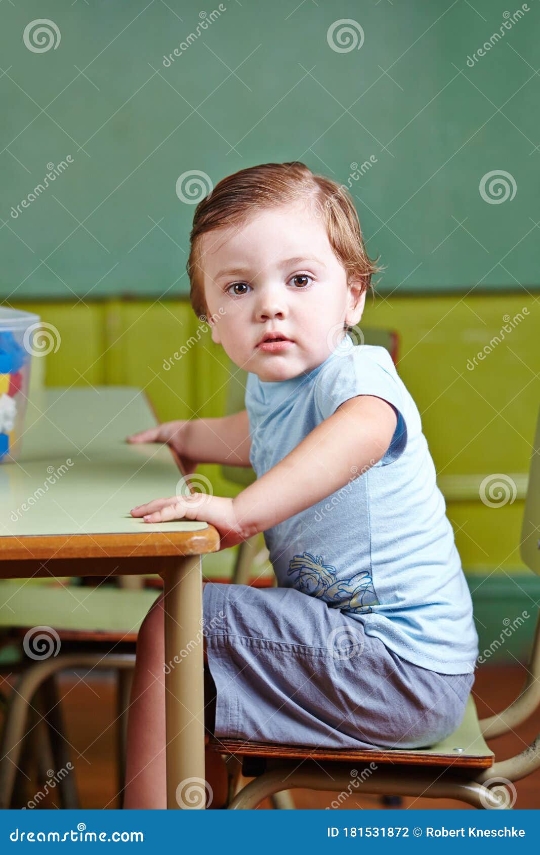 Little Boy in Kindergarten at the Table Stock Photo - Image of inside ...