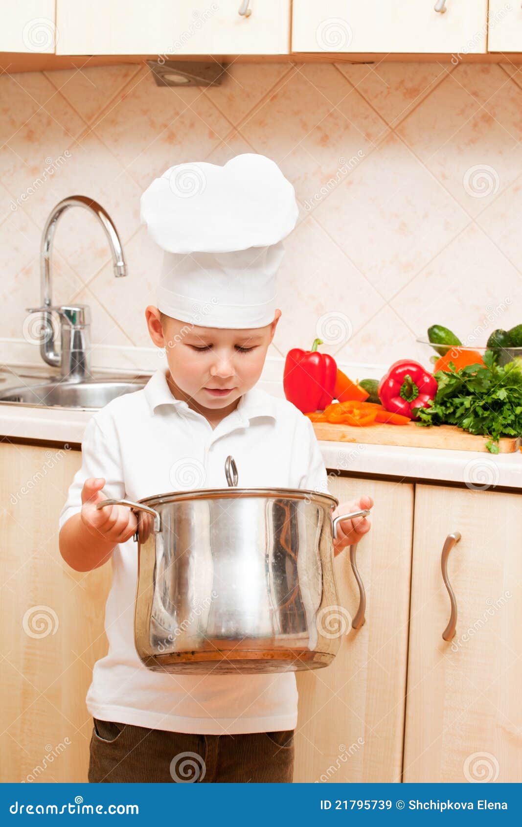 Little boy on kitchen stock image. Image of cook, looks - 21795739
