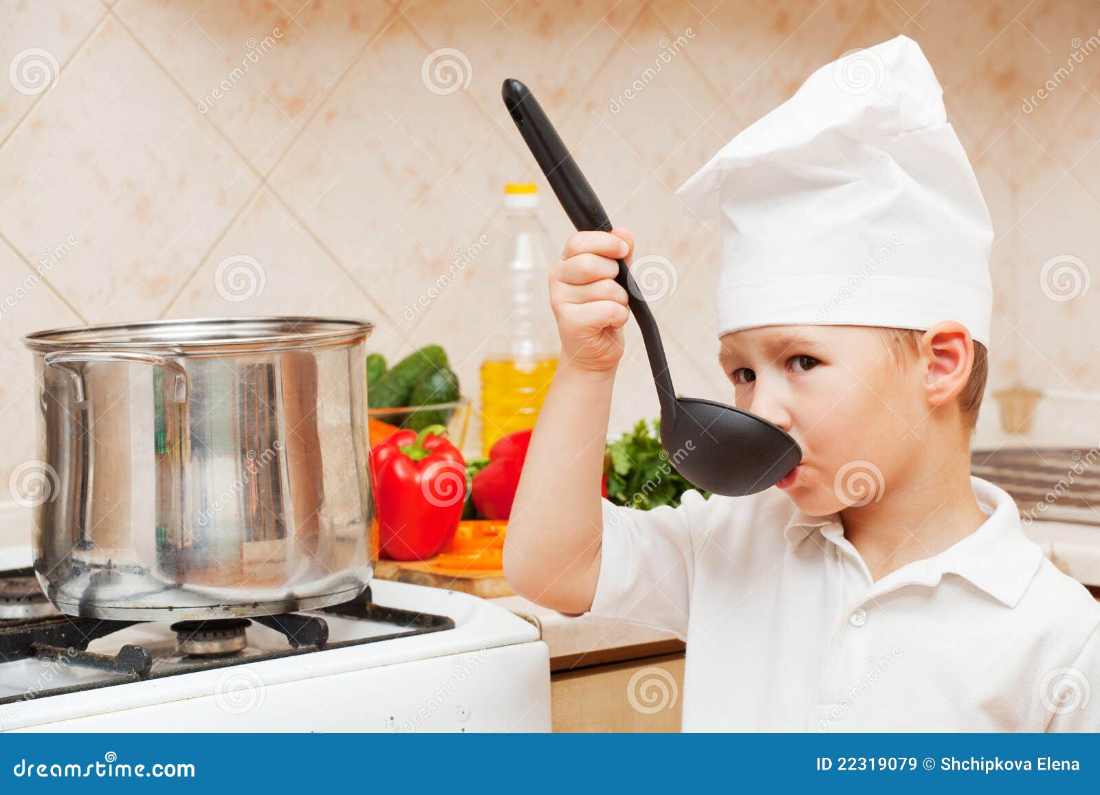 Little boy on kitchen stock image. Image of cook, looks - 22319079