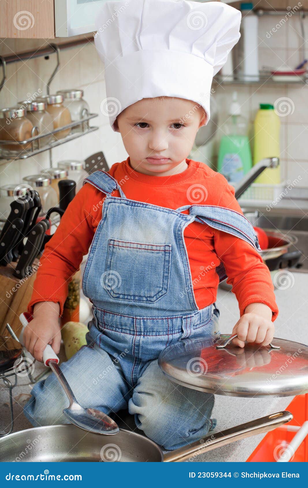 Little boy on kitchen stock photo. Image of housekeeping - 23059344