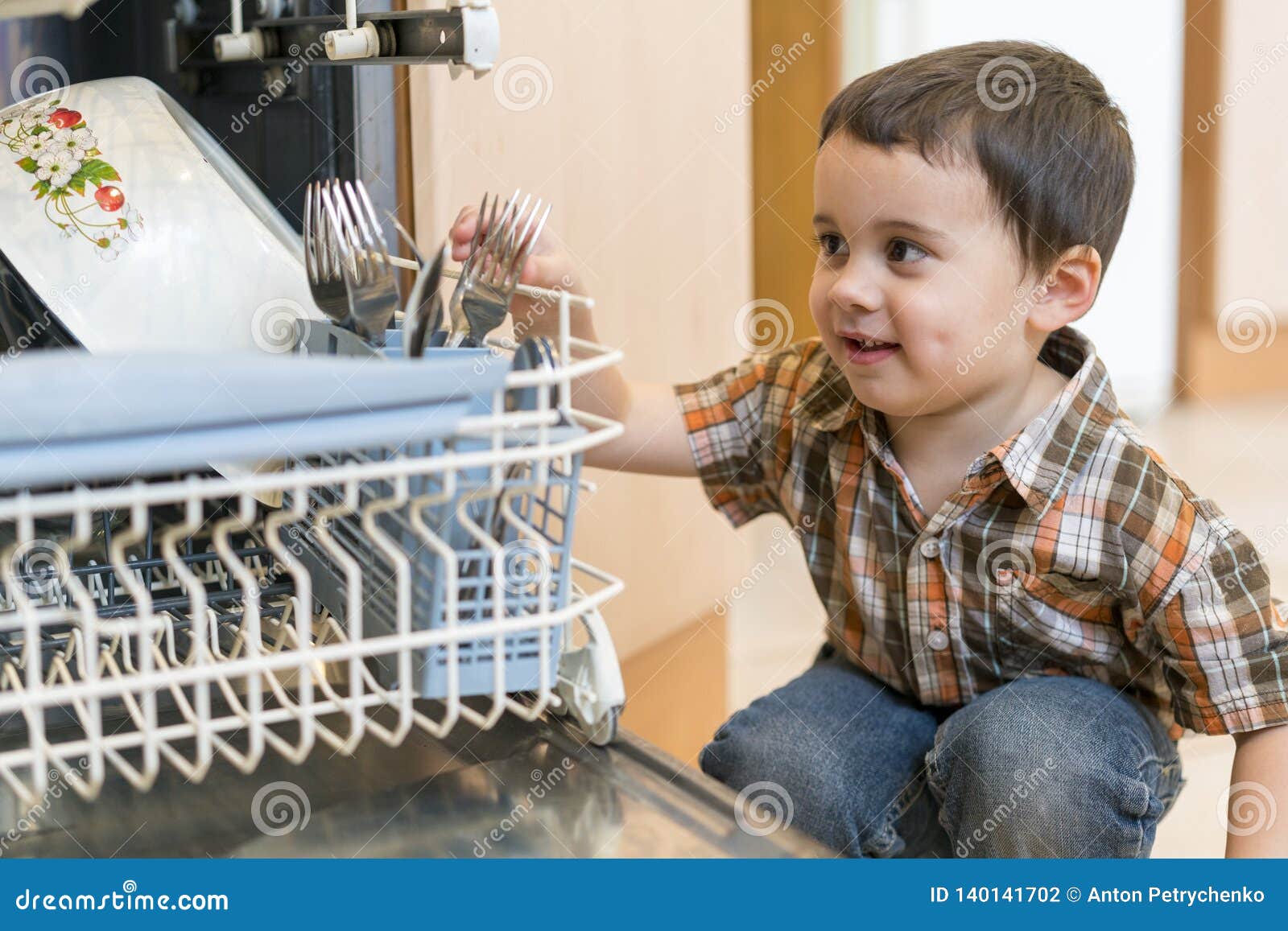 Little Boy in the Kitchen Near the Dishwasher Stock Photo - Image of ...