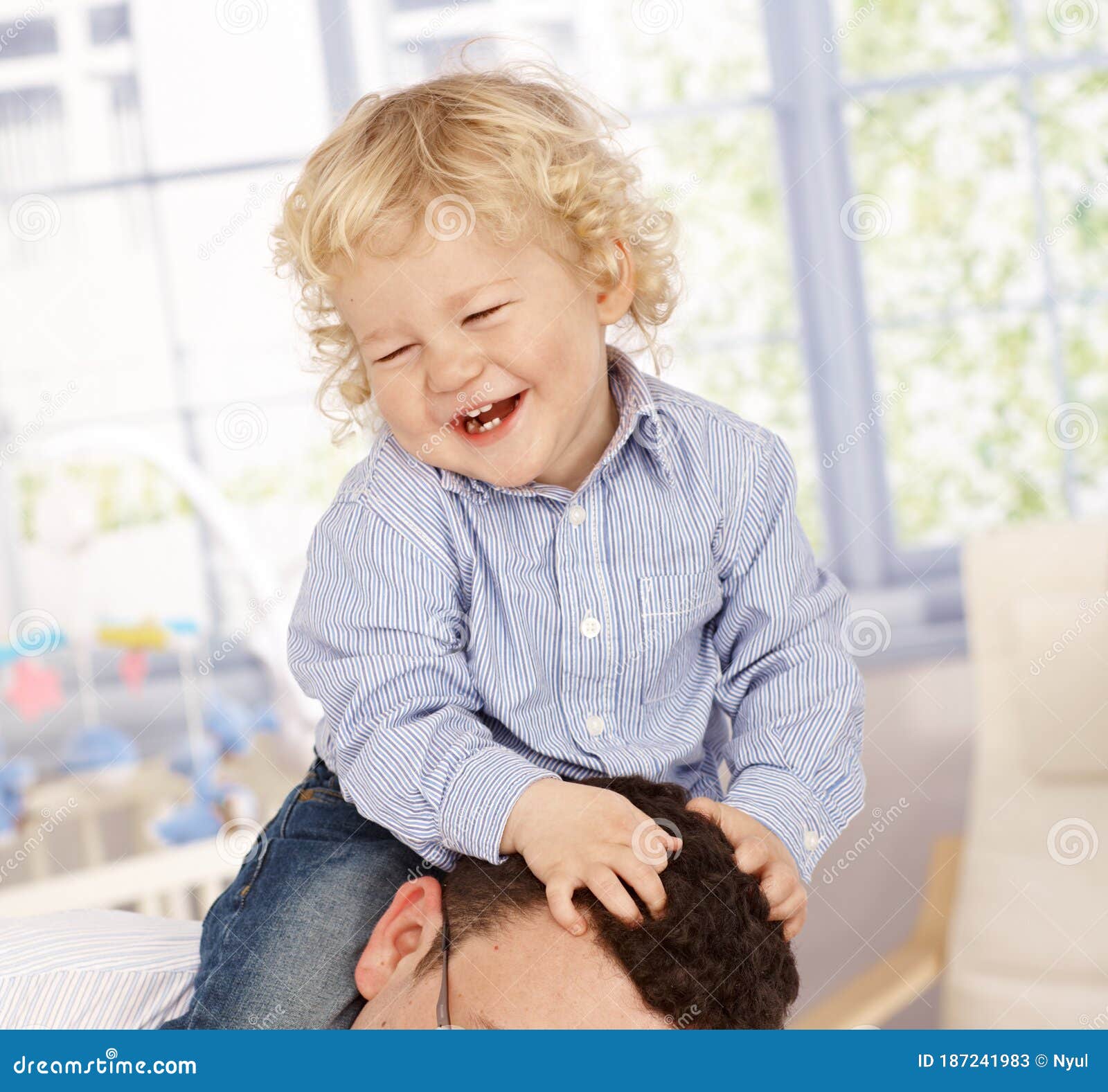 Little boy laughing stock image. Image of nordic, carrying - 187241983