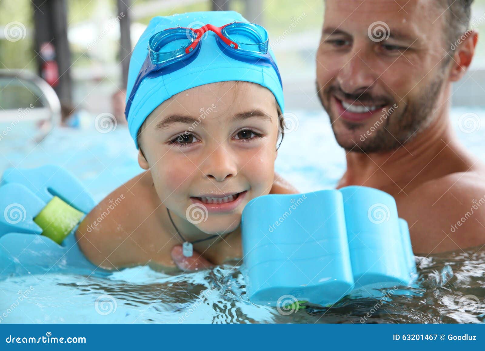 Little Boy Learning How To Swim with Instructor Stock Image - Image of ...