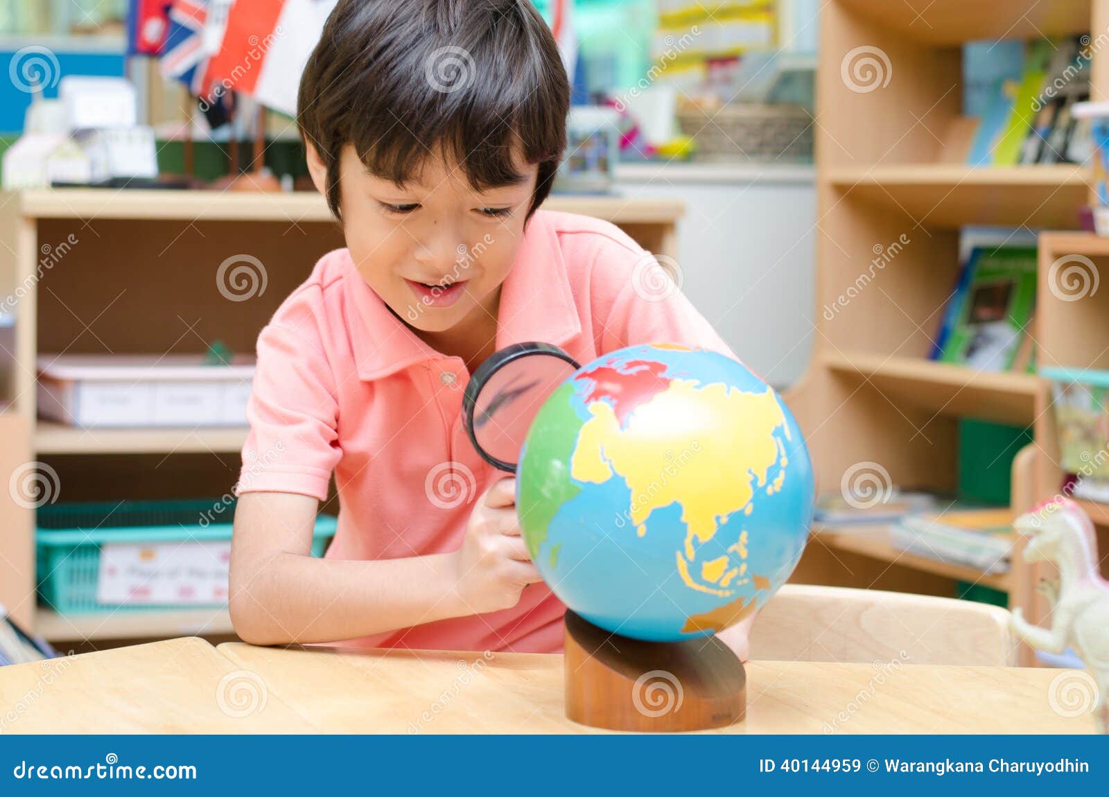 Little Boy Learning Map in Classroom Stock Image - Image of smile, blue ...
