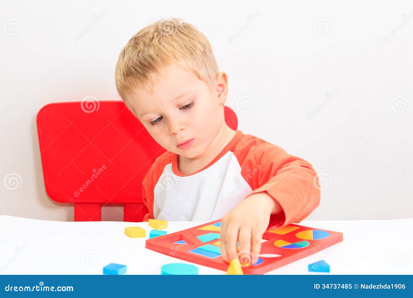 Little boy learning shapes stock image. Image of child - 34737485