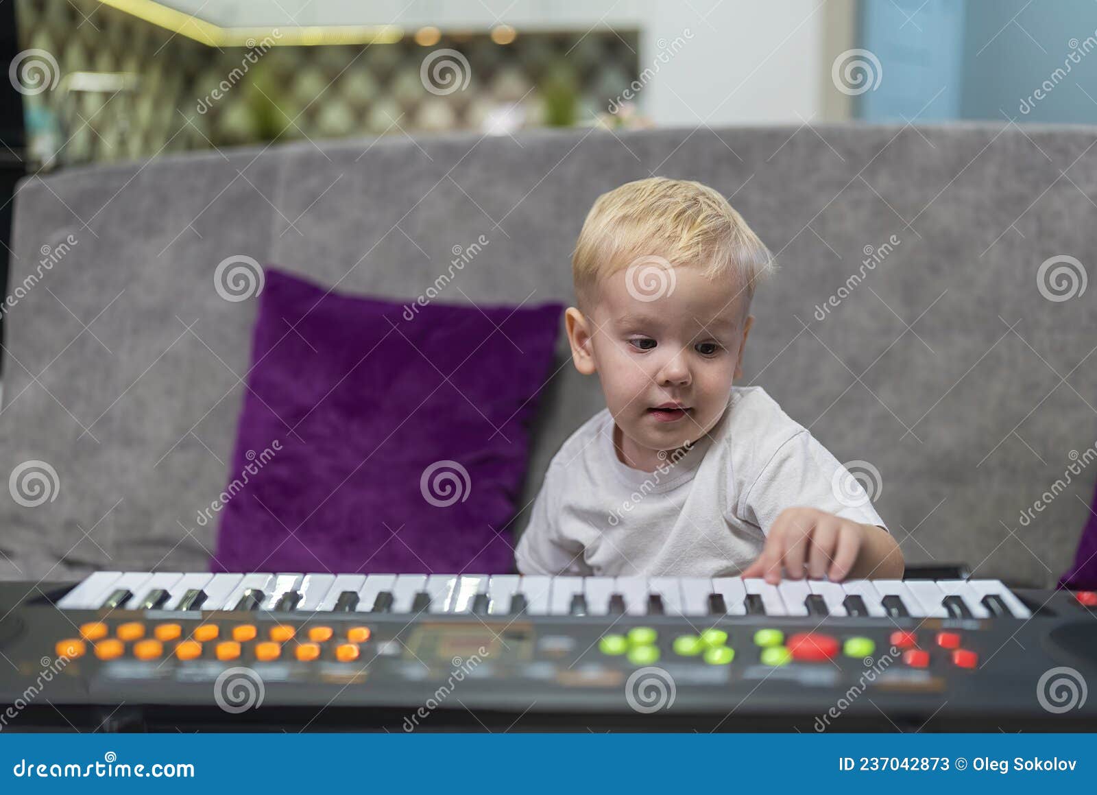 Little Boy Learning To Play the Piano at Home Stock Image - Image of ...