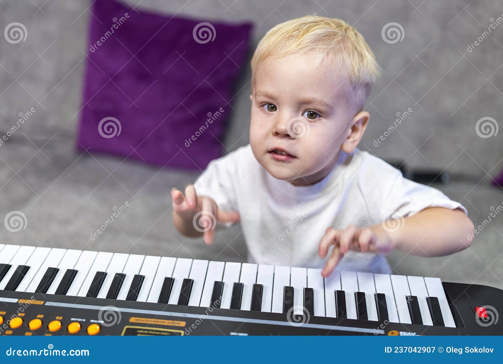 Little Boy Learning To Play the Piano at Home Stock Image - Image of ...