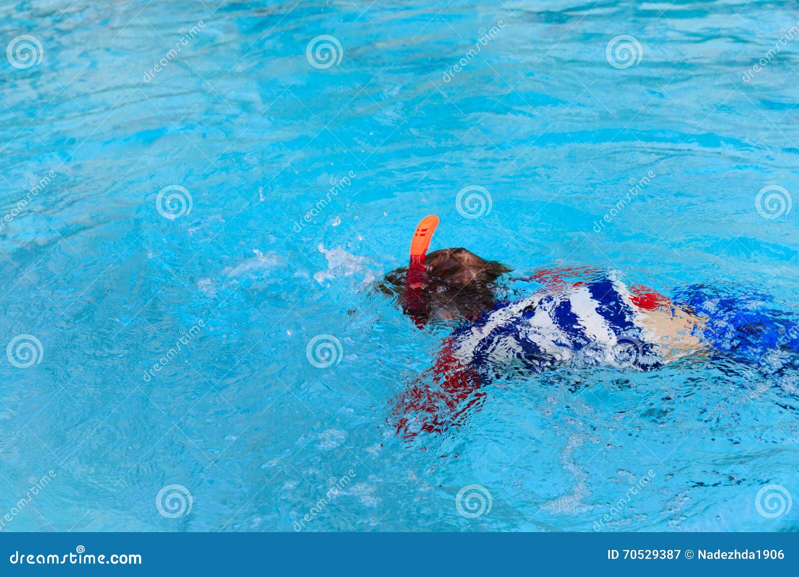 Little Boy Learns Swimming Alone in the Pool Stock Image - Image of ...