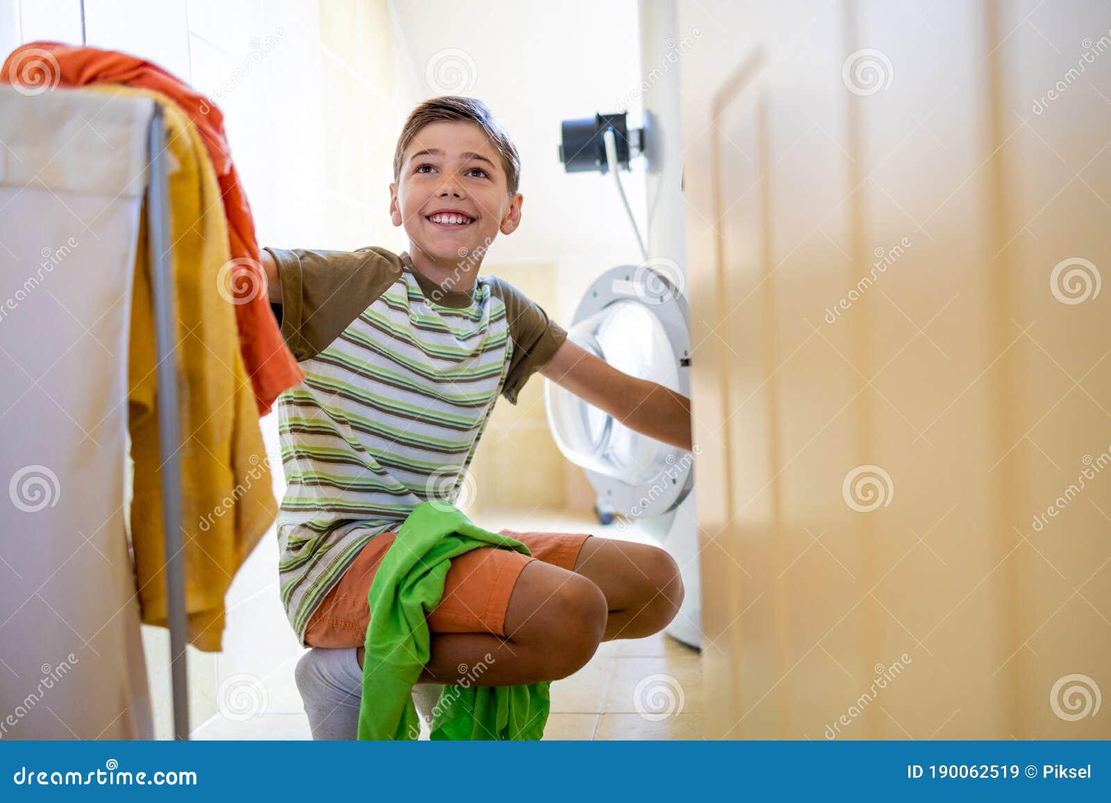 Little Boy Loading Washing Machine Stock Image - Image of family ...