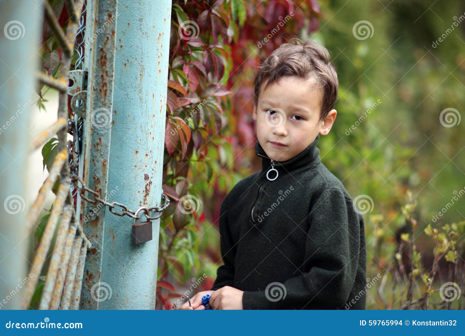 Little boy at lock door stock photo. Image of discover - 59765994